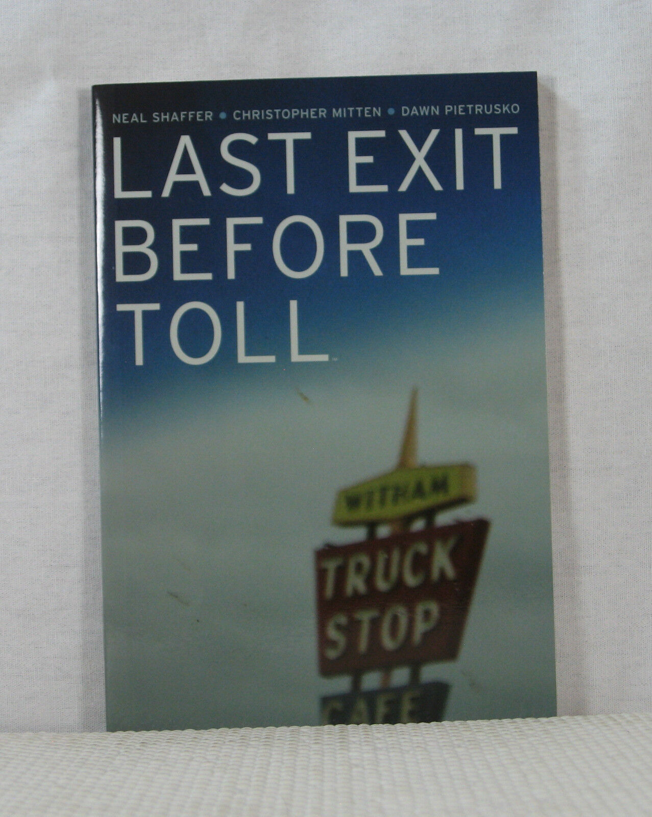 Last Exit Before Toll Neal Shaffer BRAND NEW - Sunshine Comics Last Exit Before Toll Neal Shaffer BRAND NEW - Sunshine Comics